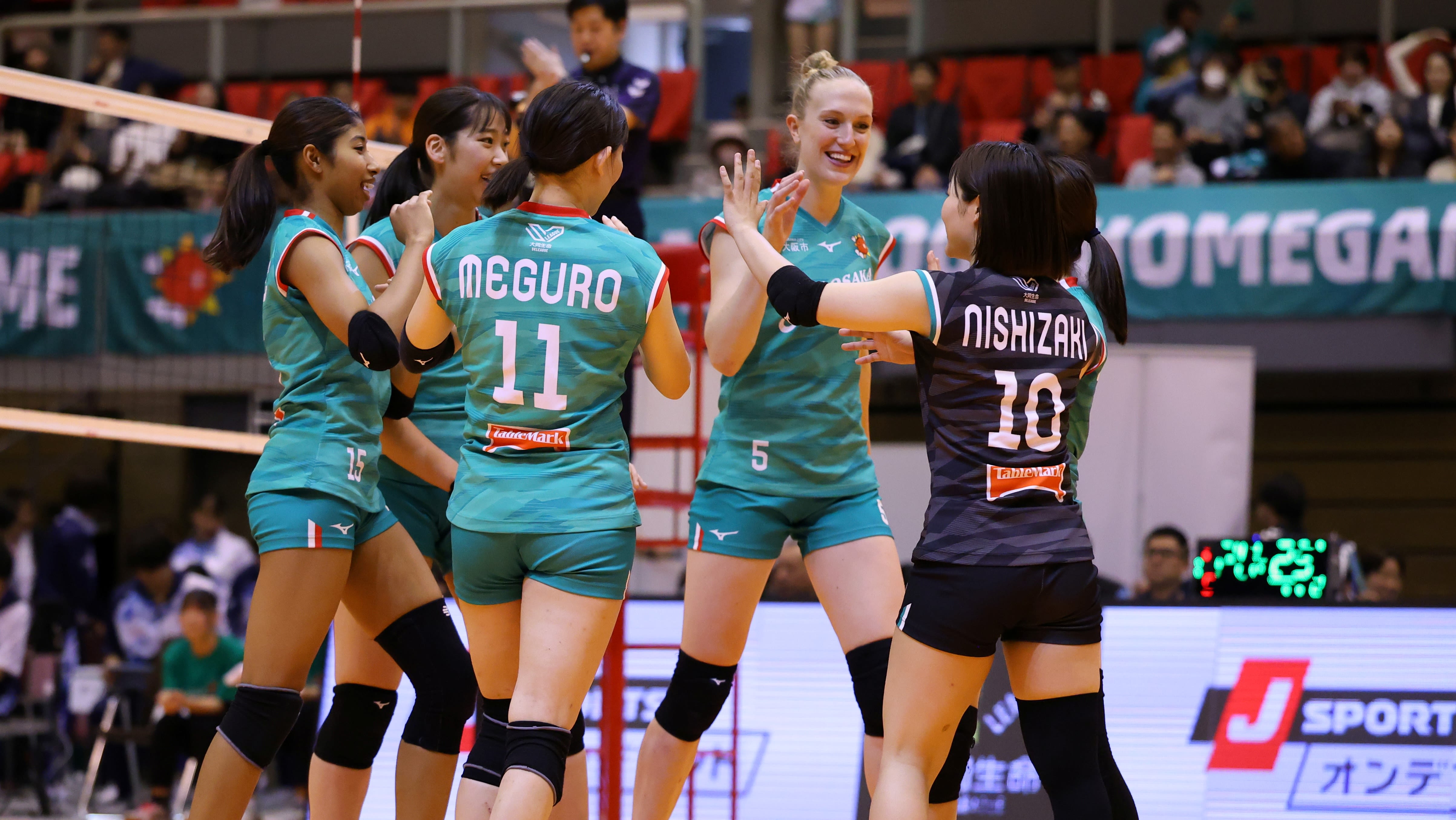 Top teams stunned in Japan